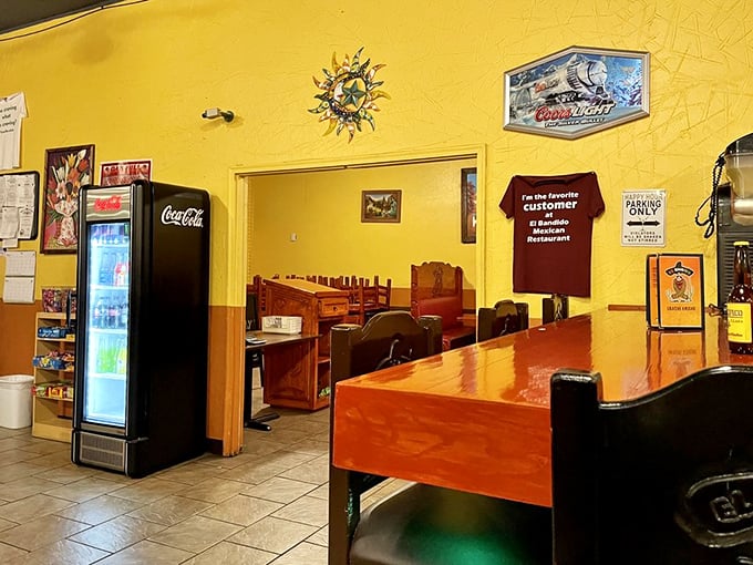 Sunshine yellow walls that could brighten even the gloomiest Monday. This isn't just d&eacute;cor&mdash;it's vitamin D for your dining experience.