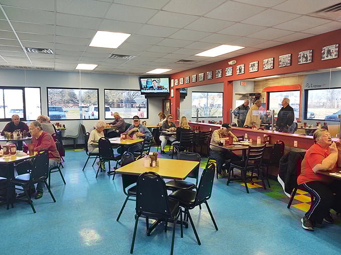 Classic diner ambiance with a side of Southern hospitality. The blue floor and simple tables set the stage for culinary magic that's kept locals coming back for decades.