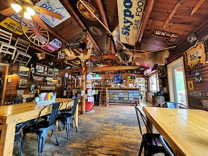 Step inside and the ceiling becomes a museum of Minnesota memories &ndash; canoes, vintage signs, and enough northwoods treasures to keep you entertained between bites.