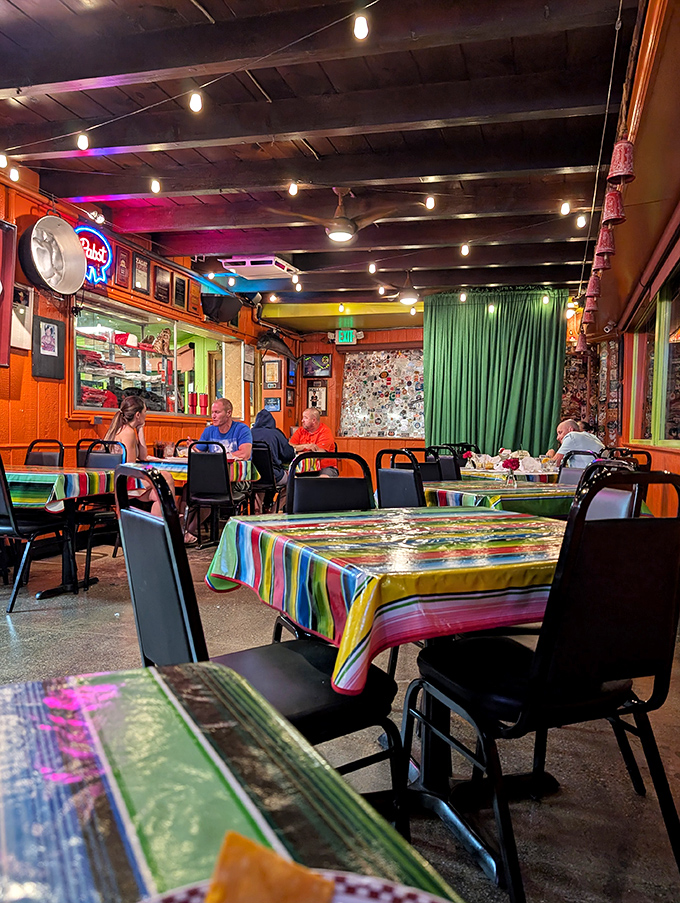 Step inside and you're greeted by vibrant serape tablecloths, wooden beams, and the unmistakable buzz of happy diners. This isn't ambiance you manufacture &ndash; it's earned.