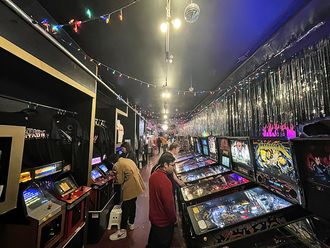 String lights and silver tinsel create the perfect backdrop for pinball wizardry. It's like Studio 54 for the arcade crowd.