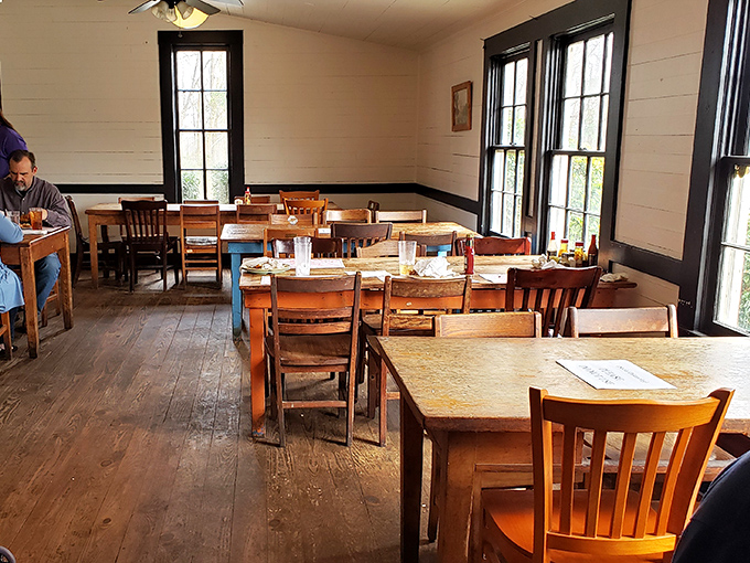 Inside, time stands still with wooden floors worn smooth by generations of hungry patrons seeking comfort food that rivals grandma's Sunday best.
