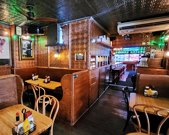Wooden booths and pressed tin ceilings tell stories of decades past. This isn't manufactured nostalgia&mdash;it's the real deal, earned one burger at a time.