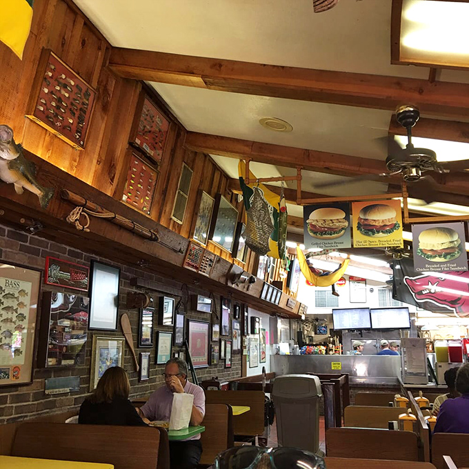 Wood paneling, fishing memorabilia, and burger photos create the perfect time capsule interior&mdash;where calories don't count and nostalgia flows freely.