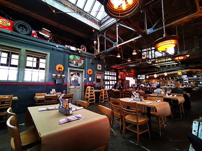 Step inside and the magic happens&mdash;industrial chic meets comfort as original garage elements frame a dining space that's equal parts museum and restaurant.