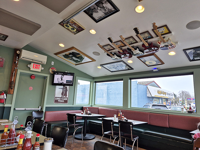 Guitar heaven meets breakfast paradise in this cozy corner booth where rock 'n' roll memorabilia watches over your morning feast.