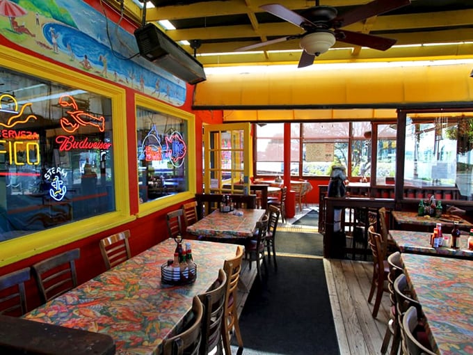 Sunshine yellow meets fire-engine red in this interior that's never heard the words "minimalist design." Every inch tells a seafood story.