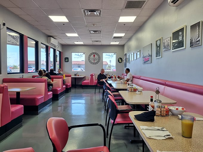 Pink vinyl booths and vintage decor set the stage for culinary time travel. This isn't Instagram-bait design&mdash;it's the real deal that's served generations.