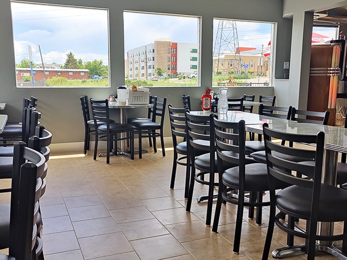 Inside, simple tables and chairs create the perfect canvas for culinary nostalgia. No pretension here&mdash;just honest comfort and conversations waiting to happen.