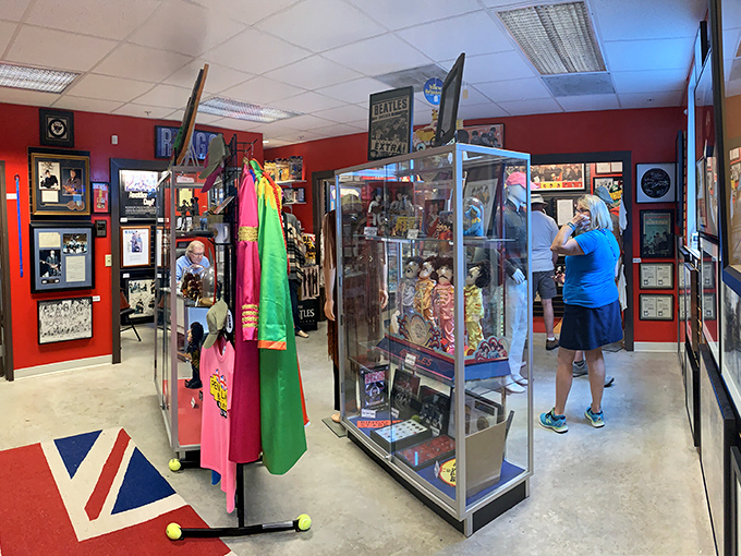 The Union Jack carpet welcomes you to this slice of Liverpool in Florida. Every inch of wall space tells the story of four lads who shook the world.