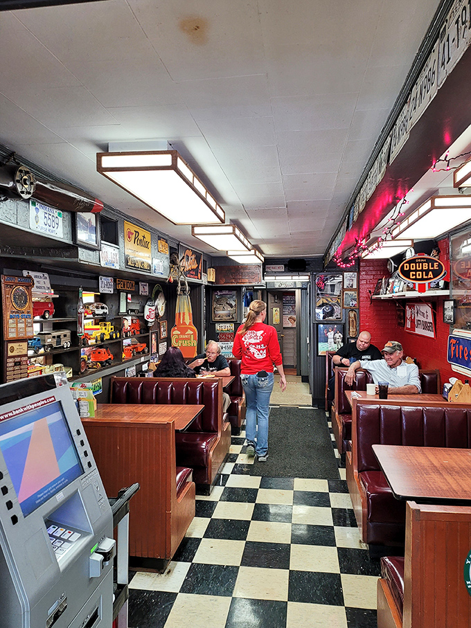 Step inside and the checkerboard floor announces you've entered the diner dimension. License plates and memorabilia create a museum of Americana where calories don't count.
