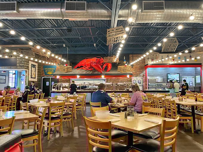 Inside, the giant red lobster suspended from the ceiling watches over diners like a crustacean guardian angel supervising your indulgence.