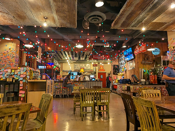 Christmas lights twinkle year-round above wooden tables, creating that "your cool friend's basement" vibe every burger deserves.