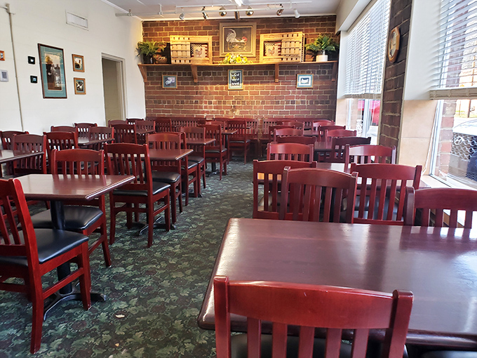Classic cherry-red chairs await hungry patrons in a dining room where conversations flow as freely as the gravy. Comfort food deserves a comfortable setting.