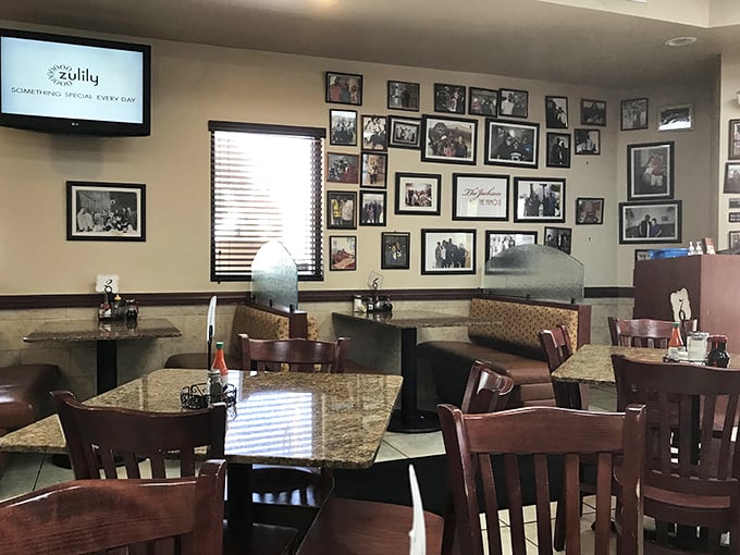 History lines these walls &ndash; decades of memories framed alongside diners creating new ones at granite-topped tables where magic happens daily.