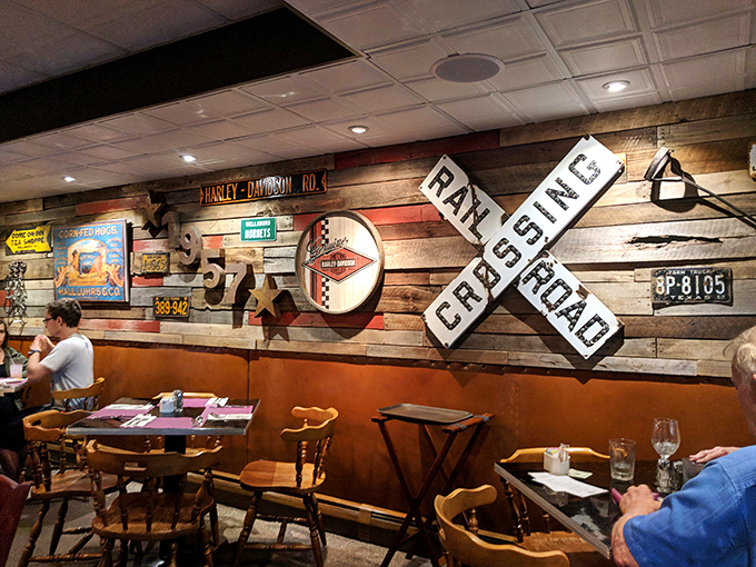 Americana meets appetite inside with rustic wood walls adorned with vintage signs and railroad memorabilia&mdash;comfort before your first bite.