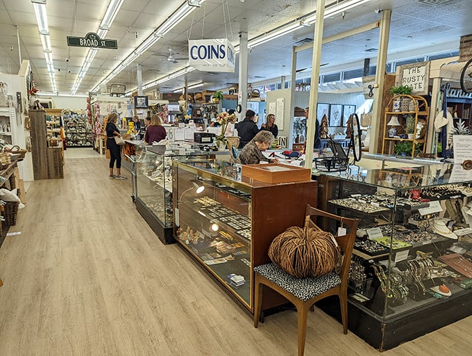 Treasure hunters navigate aisles where every glance reveals something new. That pumpkin on the chair? Someone's future heirloom.