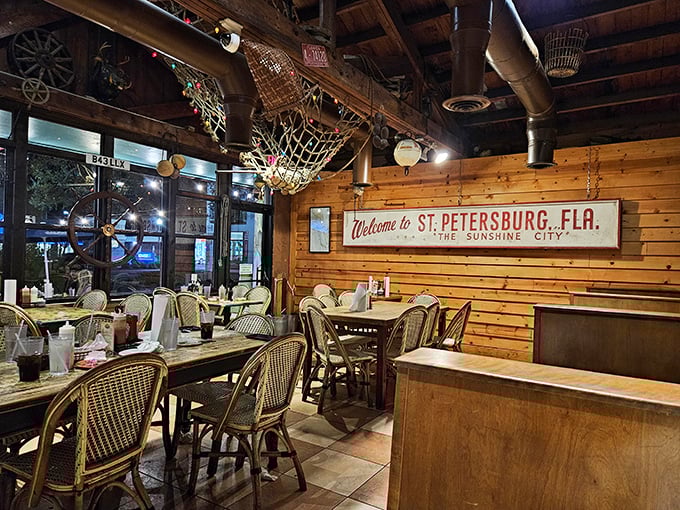 Step inside and you're transported to Old Florida—wooden walls, fishing nets, and that "Welcome to St. Petersburg" sign that feels like a warm embrace.