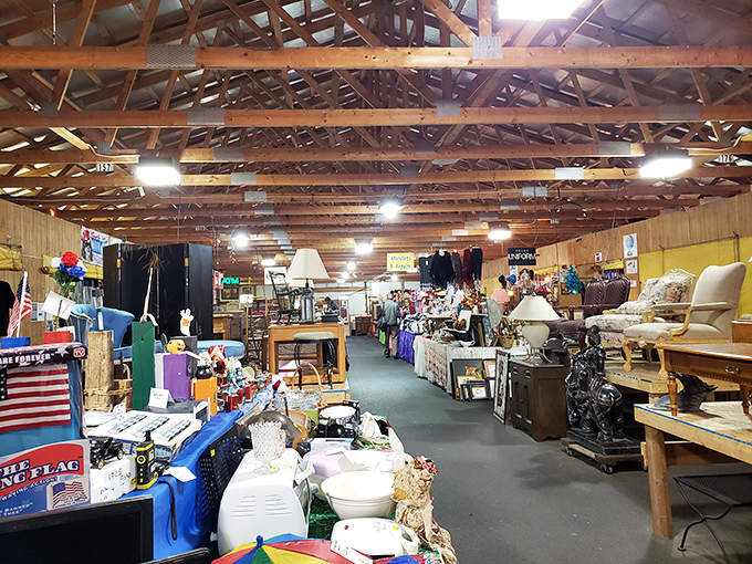 Exposed wooden beams overhead create cathedral-like shopping where every aisle holds potential miracles and magnificent finds.