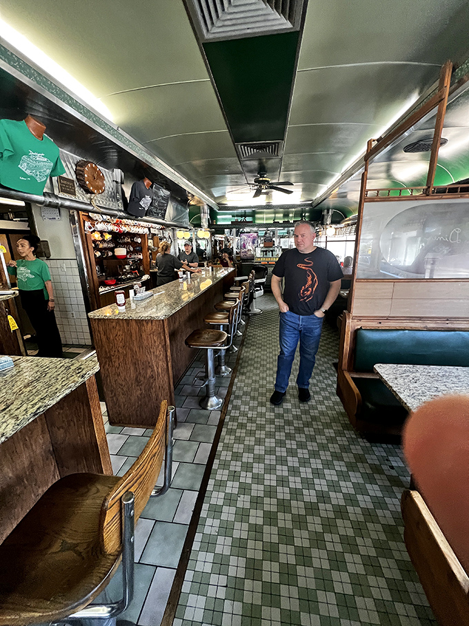 Narrow aisles, chrome fixtures, and that unmistakable diner buzz—this isn't retro by design, it's authentic by survival. American breakfast culture preserved in amber.