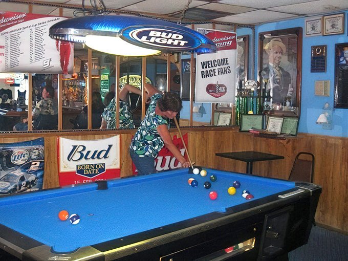 Where everybody knows your game. The blue felt pool table matches the walls in this cozy neighborhood hangout where competition is friendly and the atmosphere welcoming.