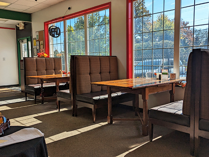 Sunlight streams through red-trimmed windows, casting a warm glow on simple wooden booths where pierogi dreams come true.