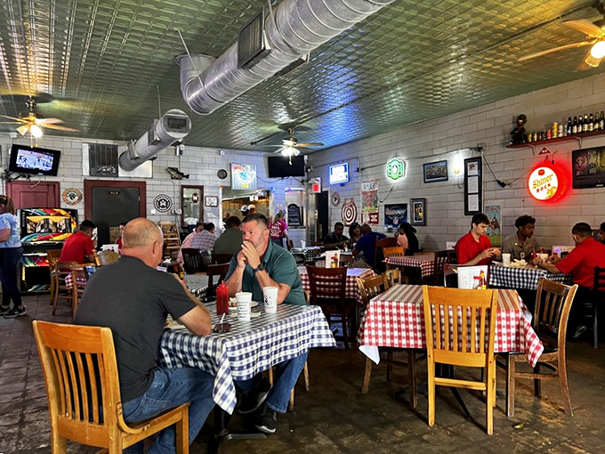 Red and white checkered tablecloths set the stage for a comfort food symphony. This isn't fine dining&mdash;it's better.