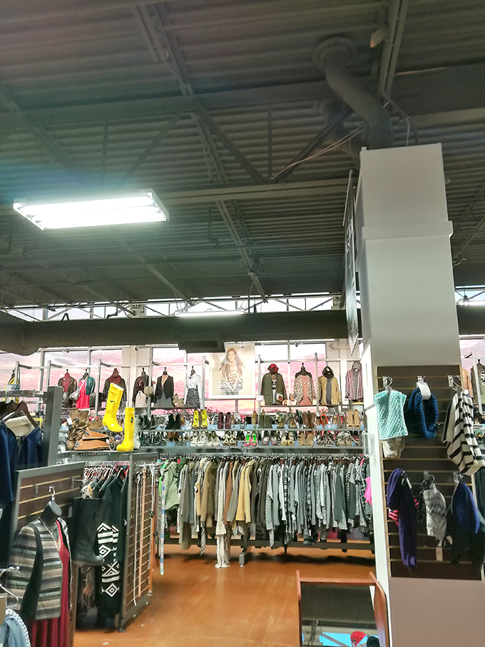 Racks upon racks of carefully curated clothing await exploration. It's like an archaeological dig where every layer reveals designer treasures.