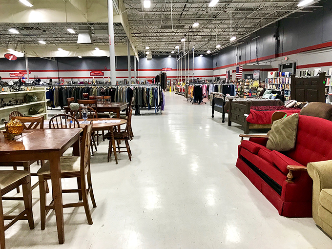 Where furniture finds second chances and shoppers find unexpected joy. That red couch is practically begging to tell stories.
