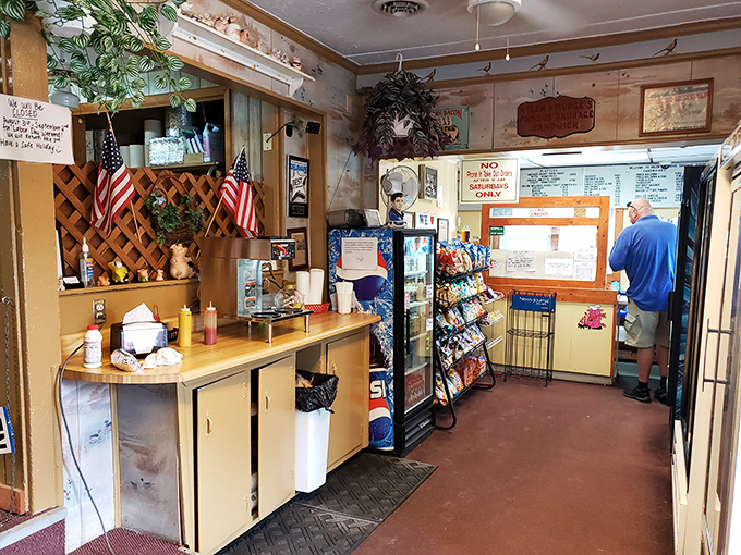 No fancy interior design awards here&mdash;just the honest charm of wood paneling, American flags, and the promise of breakfast nirvana.
