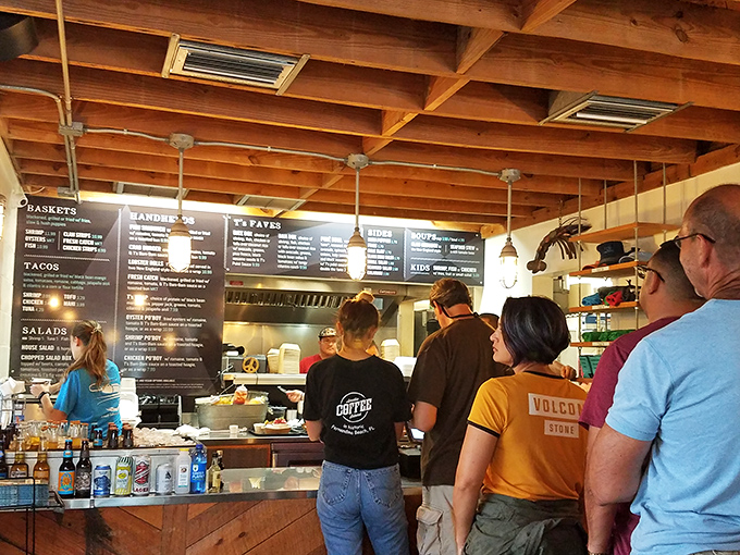 The lunch rush at Timoti's is like watching a delicious choreography&mdash;customers eagerly scanning the menu while staff orchestrate a symphony of seafood behind the counter. 