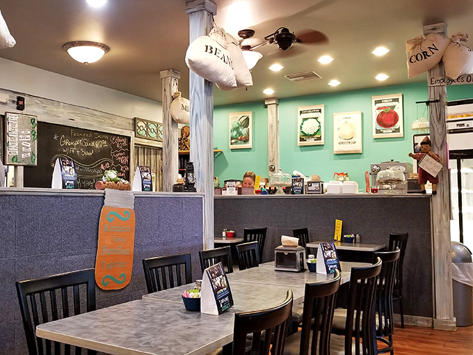 Mint green walls, decorative seed packets, and rustic columns create the perfect backdrop for comfort food conversations that inevitably become the best part of your day.