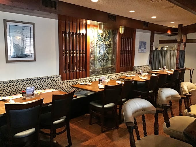 Nautical details adorn every corner of the dining room, creating that perfect "seaside without the seagulls stealing your food" atmosphere.