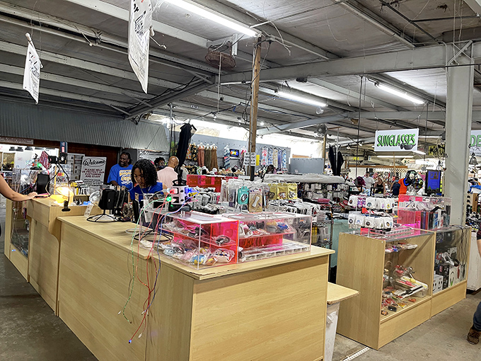 Sunglasses and gadgets galore! This vendor's display case is a time capsule of technology trends and Florida sun protection essentials.