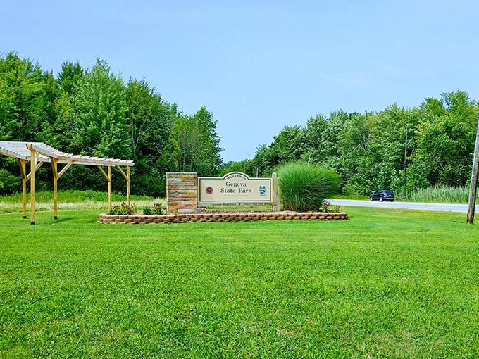 The welcoming gateway to adventure &ndash; Geneva State Park's entrance sign promises 698 acres of lakeside magic waiting to be discovered.