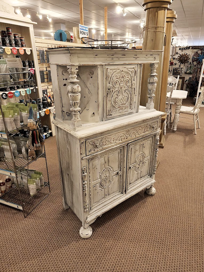This distressed white cabinet isn't just furniture—it's a time machine with drawers. Imagine the stories it could tell about dinner parties past.