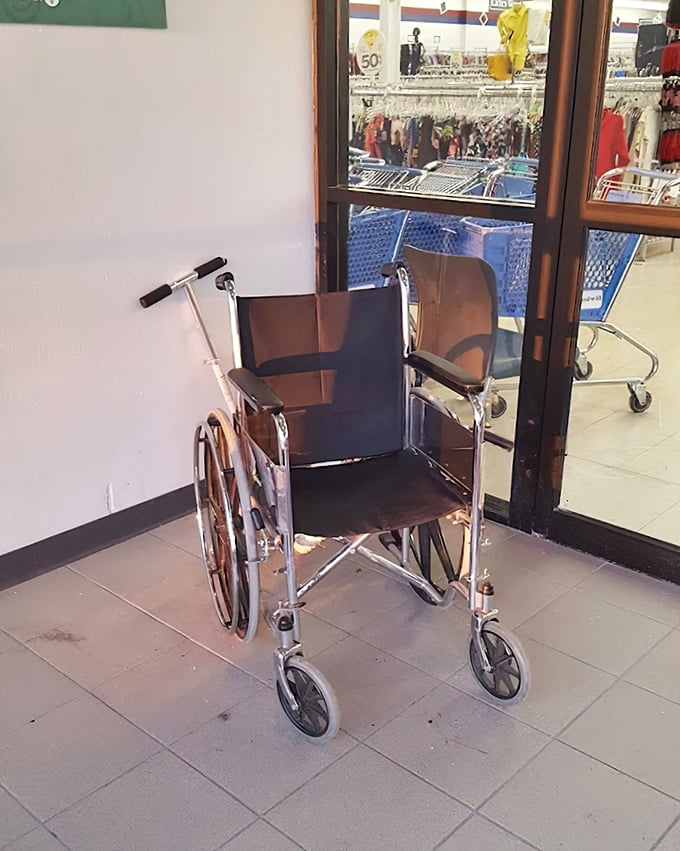 This vintage wheelchair isn't just medical equipment&mdash;it's a time capsule on wheels, waiting for its next chapter while shoppers hunt for treasures beyond.