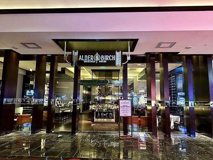 Alder & Birch's sleek entrance beckons with promises of modern luxury and old-school steak mastery in one elegant package.