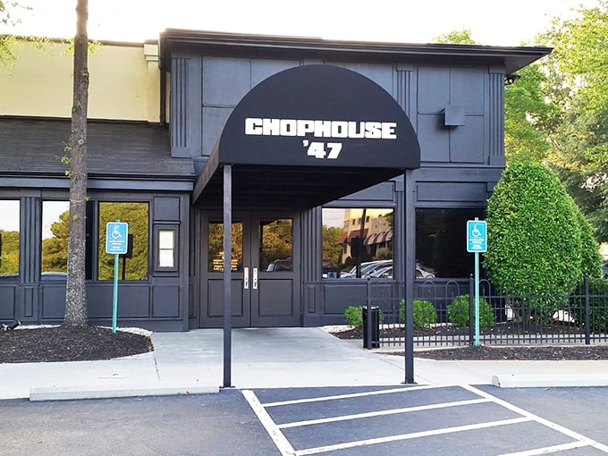 Chophouse '47's sleek black exterior is like the tuxedo of steakhouses—formal, distinguished, and promising a memorable evening ahead.