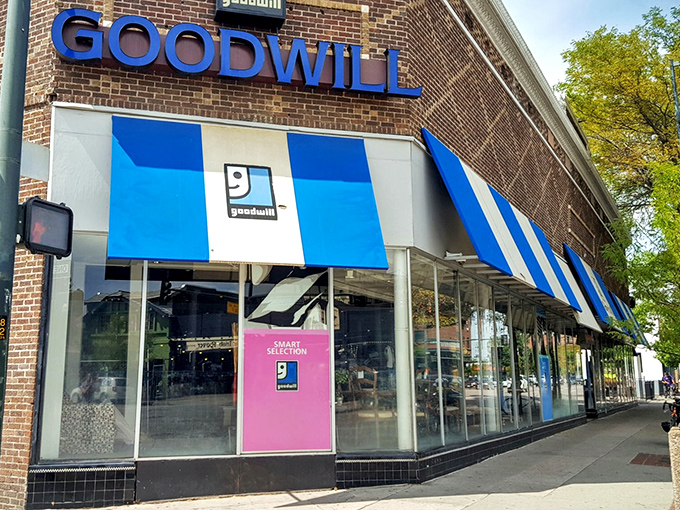 Goodwill's brick fortress stands ready for treasure hunters. It's the archaeological dig site where your wallet actually gets heavier! 