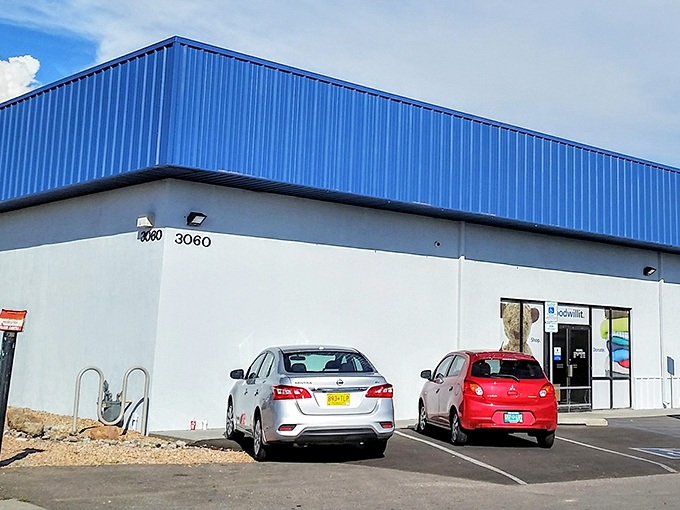 Goodwill's bright interior makes treasure hunting a breeze. Those color-coded racks are organized better than my retirement plans!