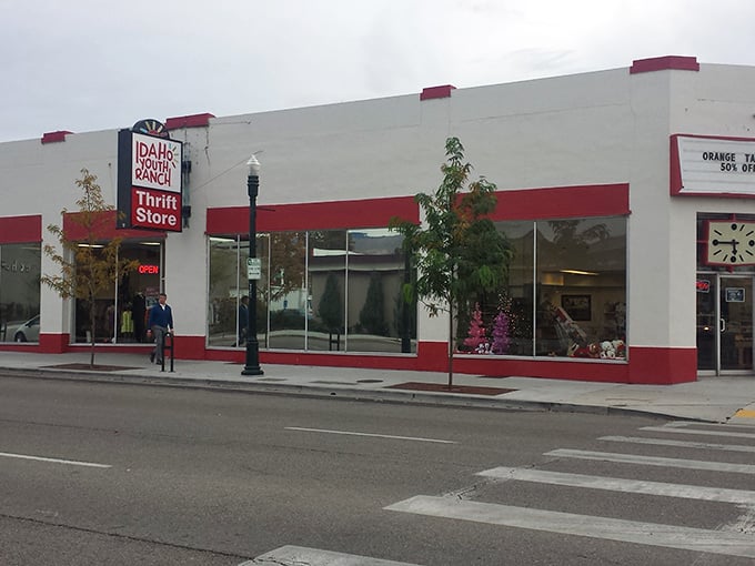 Idaho Youth Ranch's classic red and white facade is like a beacon for thrift enthusiasts. Vintage vibes with modern treasures inside!