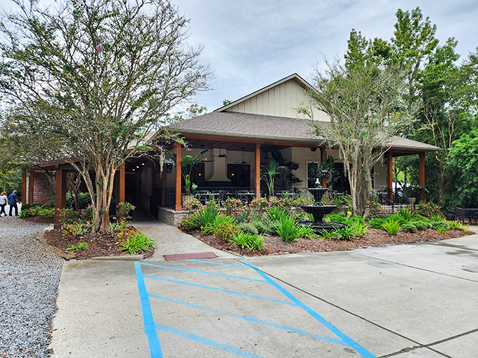 A country porch welcome with a fountain serenade – rustic charm meets culinary excellence.