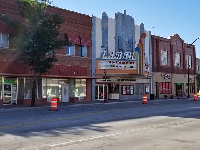 Lamar's Main Street whispers stories of yesteryear. The Coors sign and "Furnished Rooms" advertisement transport you to a simpler time when conversations happened face-to-face.