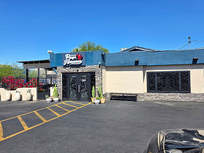 Mariscos Playa Hermosa's blue exterior might be understated, but what happens inside is a seafood fiesta worth writing home about.