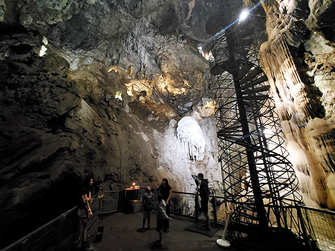 Massive cathedral-like chamber where stalactites reach down like nature's chandeliers. The acoustics in here would make Pavarotti jealous!