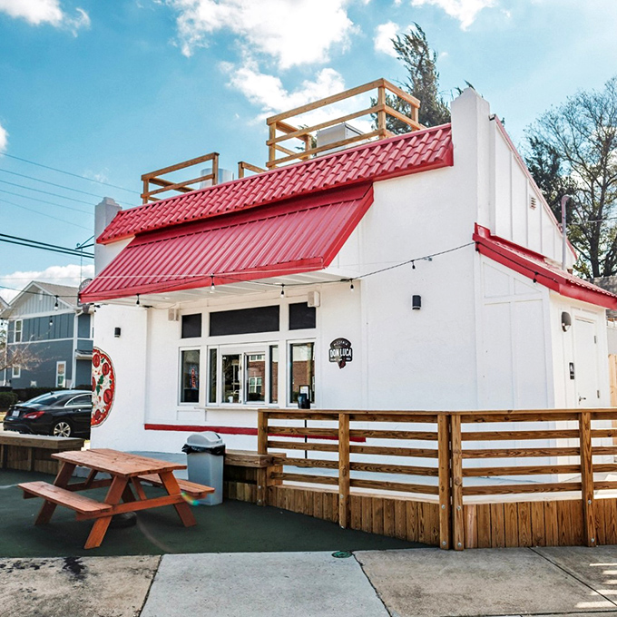 Don Luca's charming white building with red accents looks like it was plucked straight from a storybook about pizza dreams.