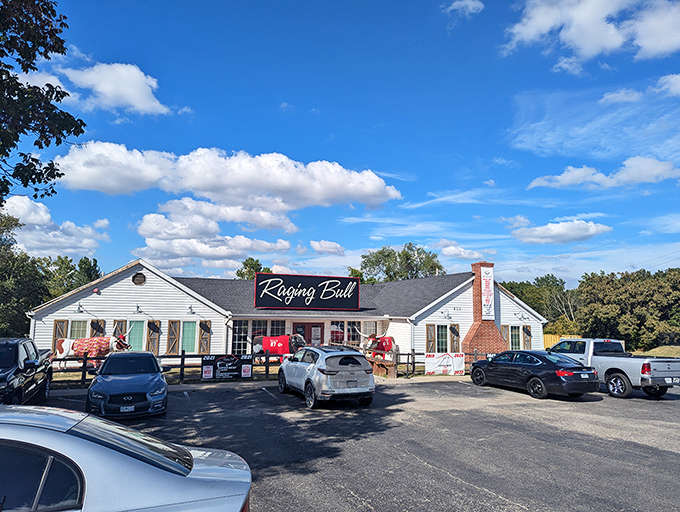 The Raging Bull's unassuming white exterior hides a steakhouse that packs more flavor than a heavyweight champion's punch.