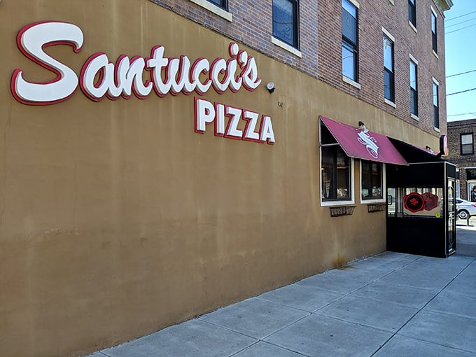 Santucci's golden signage promises square pizza perfection, because sometimes the best things come in unexpected shapes.