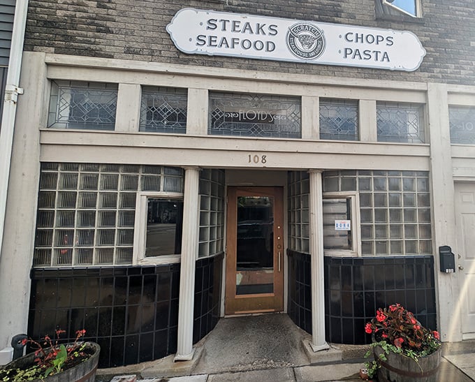 The historic brick fa&ccedil;ade of SScratch Steakhouse whispers tales of steaks past, present, and future to hungry passersby.